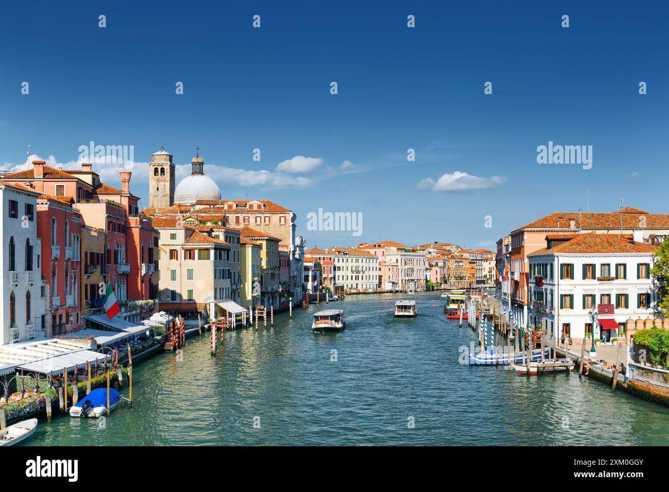 Water buses rides along the Grand Canal in Venice, Italy Stock Photo ...