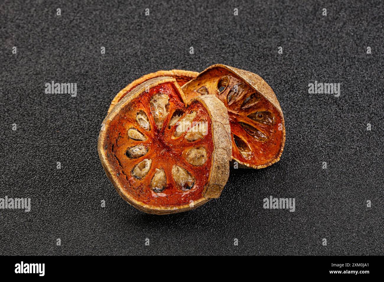 Thai cuisine - dry bael fruit for drinks Stock Photo - Alamy