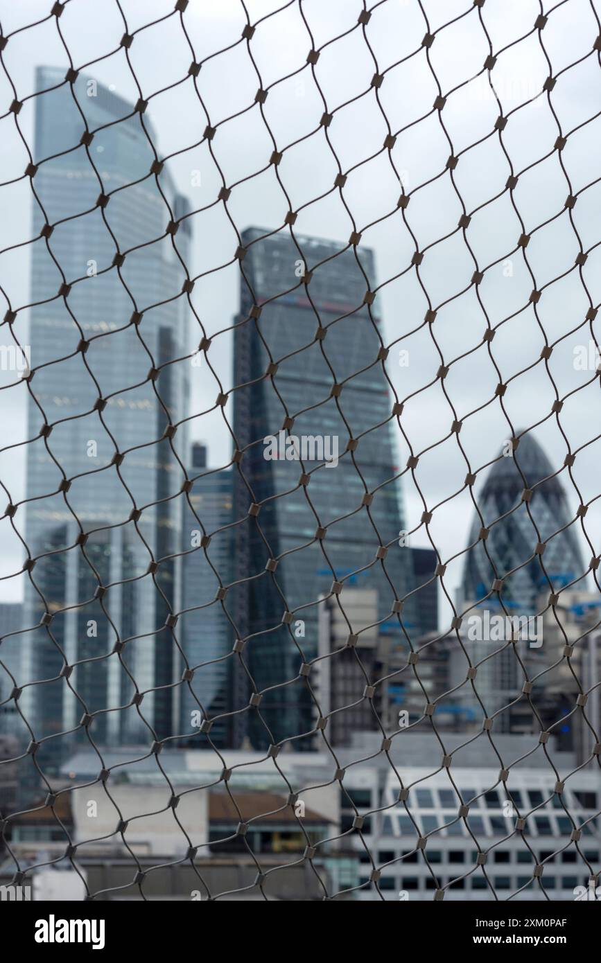 Unusual defocused obstructed view of the City of London buildings ...