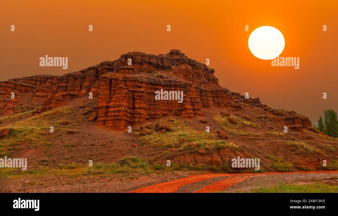 Red fairy chimneys shaped like formations that are millions of years ...