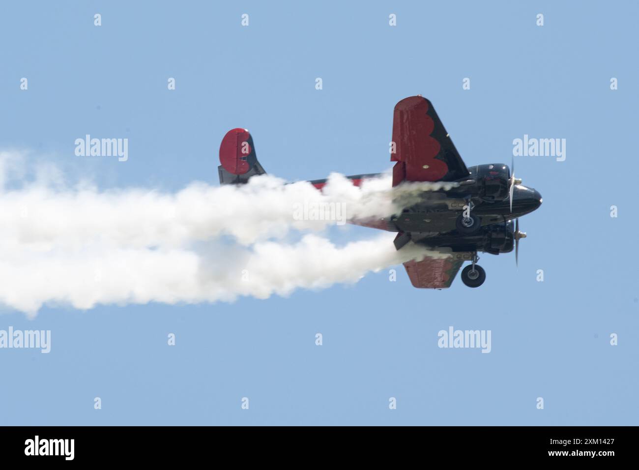 A Beech 18 aircraft performs during the Wings Over Whiteman Air Show at ...
