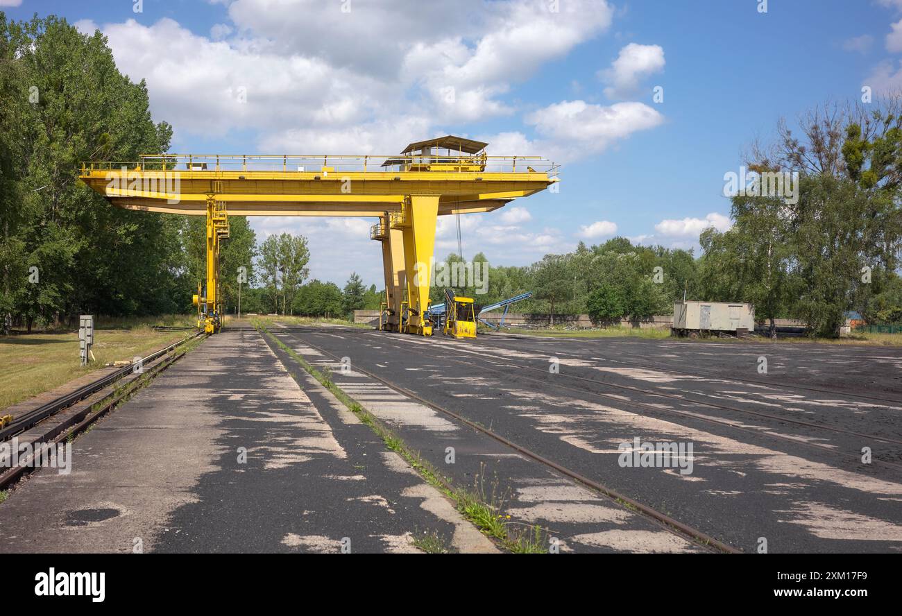Coal handling crane and rail ramp Stock Photo - Alamy