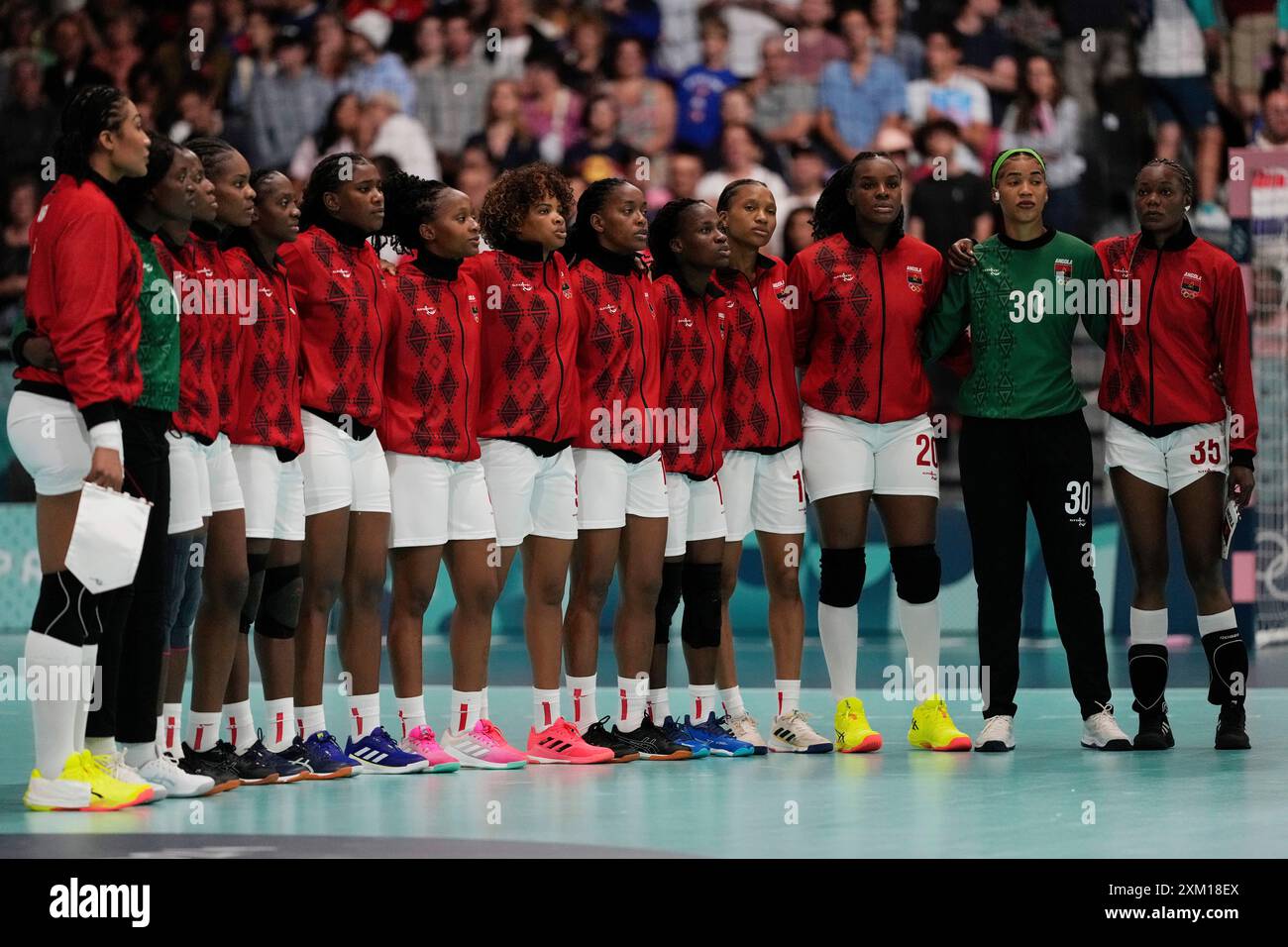 Team Angola stands during the national anthem ahead of the Paris 2024 ...