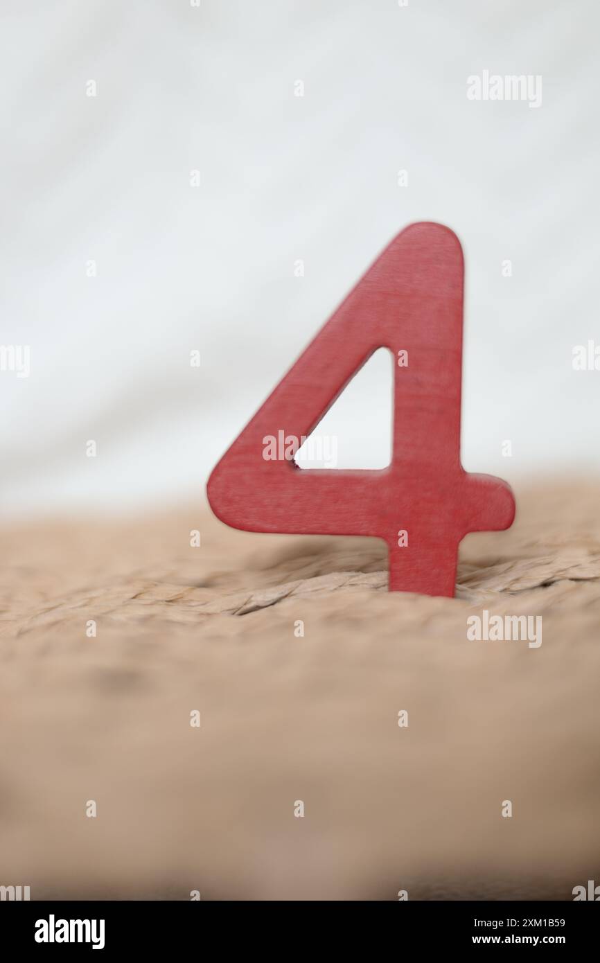 Close-up wooden figure number on a white blurred background Stock Photo ...