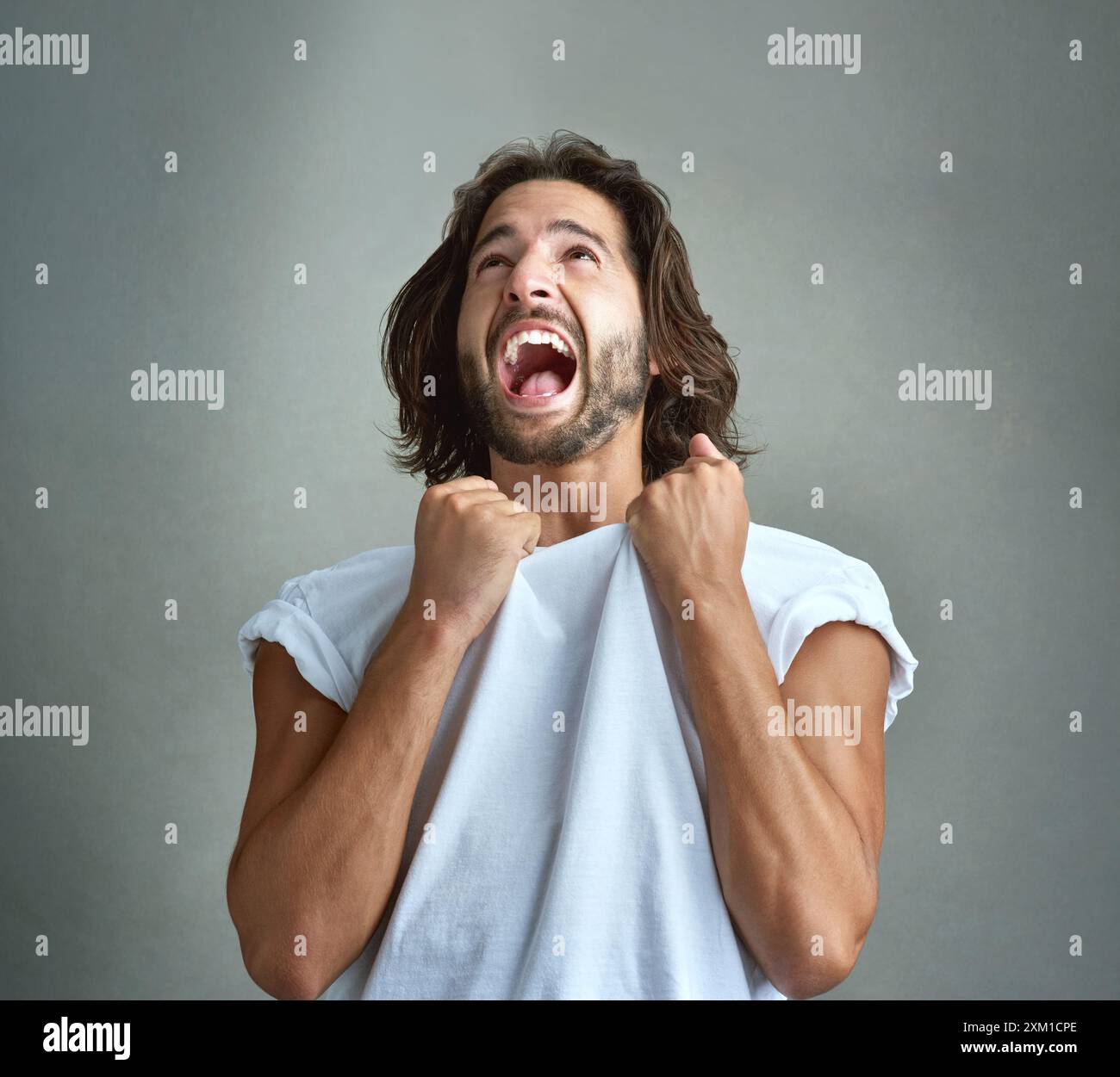 Studio, man and angry with pulling of shirt for bad news, stress and ...