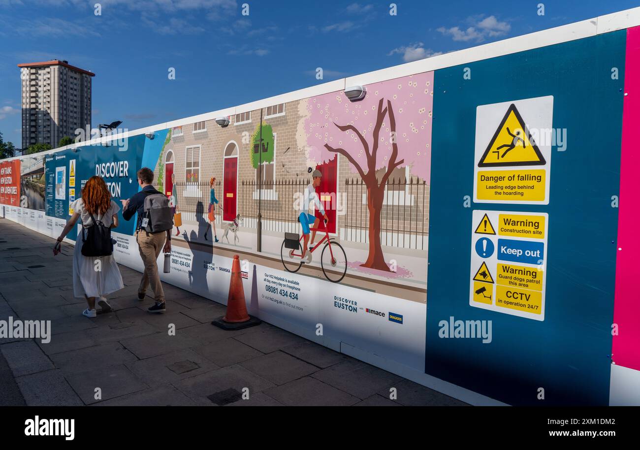 People walking past the construction work site of the now interrupted ...