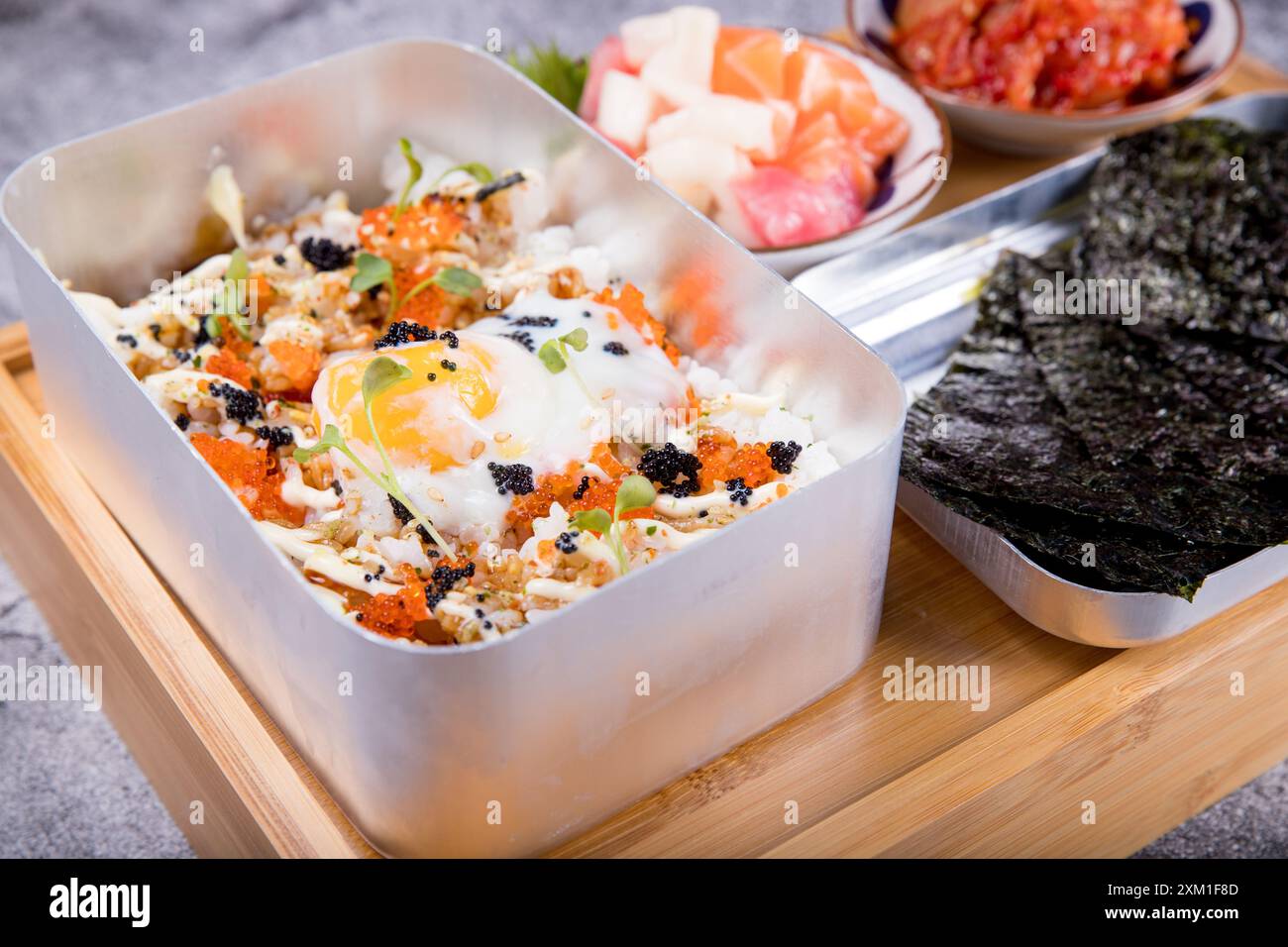 Open-style, seasoned raw fish sushi Stock Photo - Alamy