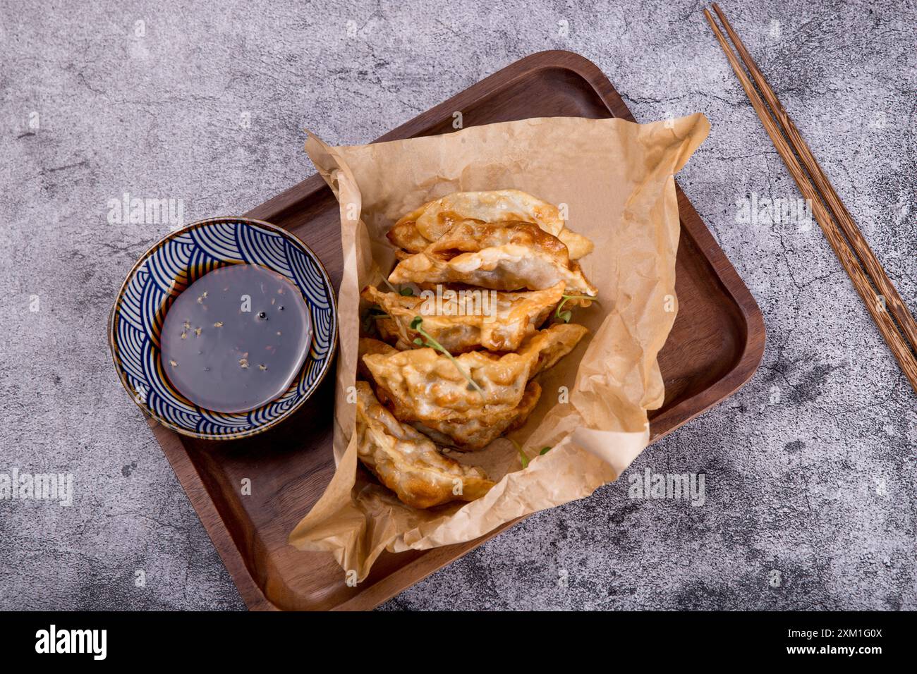 Gyoza, pot sticker, pan-fried dumpling，Guotie on a white background ...