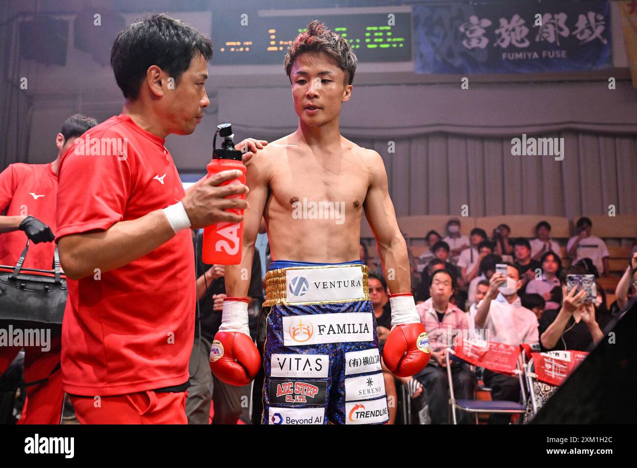 Tokyo, Japan. 18th July, 2024. Seiya Yamaguchi, right, enters the ring with trainer Ryo Kitano ...