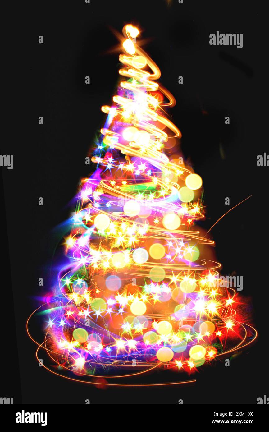 christmas tree with the color lights in the night Stock Photo - Alamy