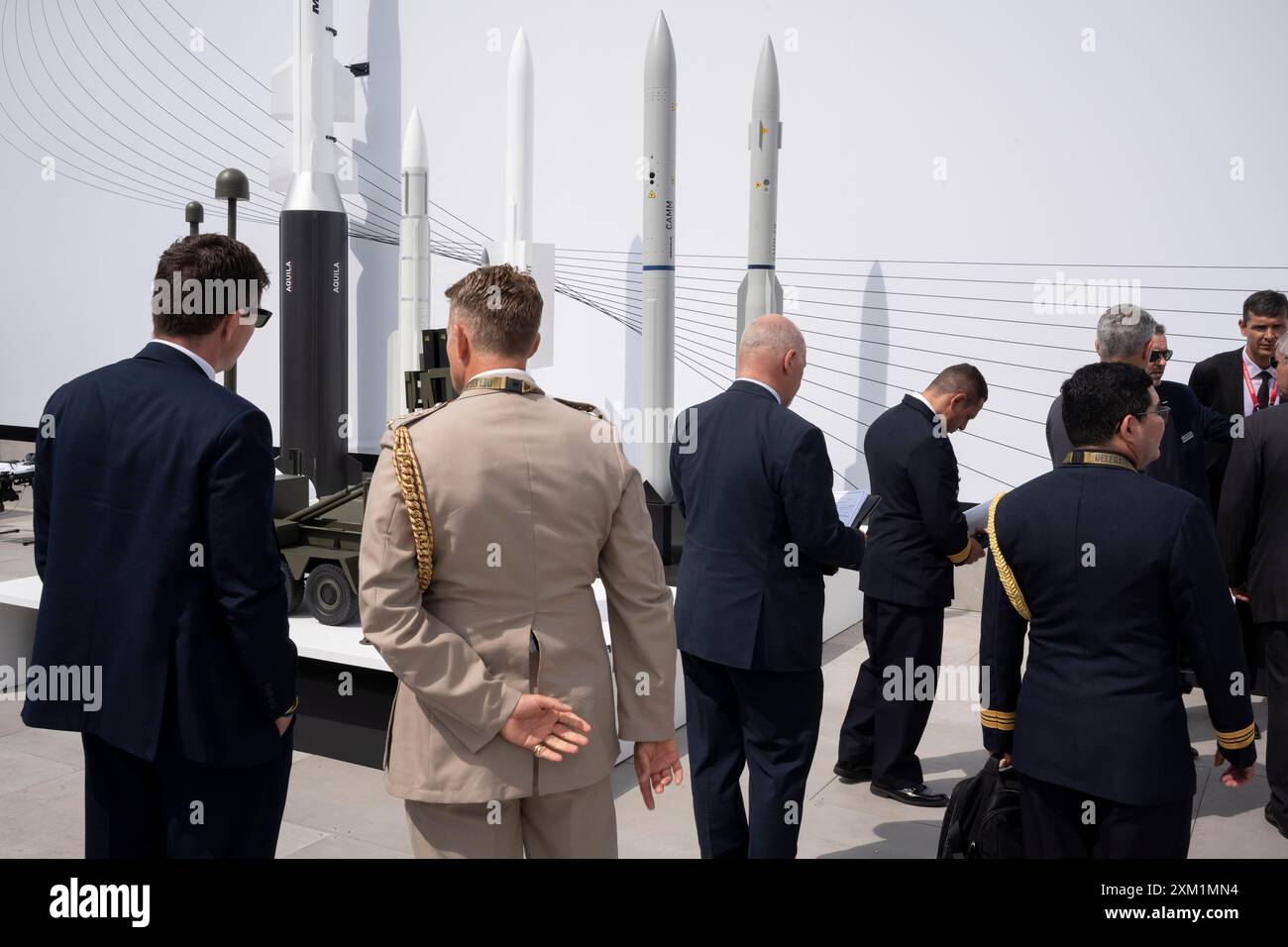 Visitors inspect missile and defence technology at defence manufacturer ...