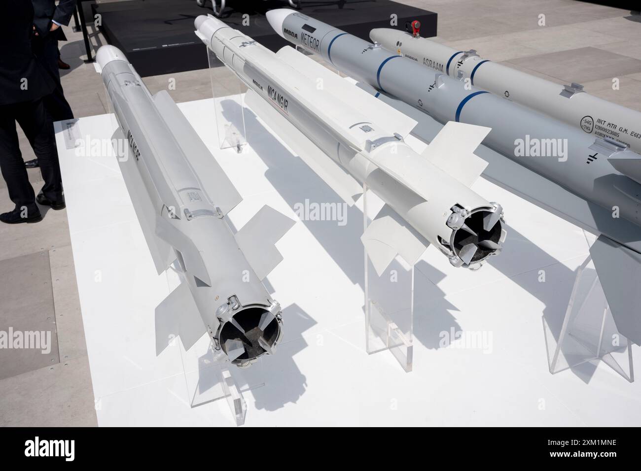 Visitors inspect missile and defence technology at defence manufacturer ...