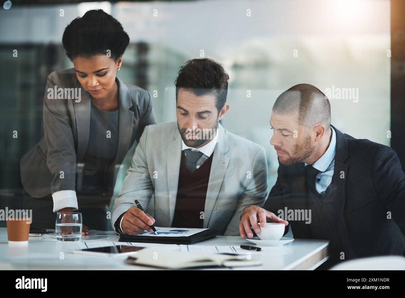 Business people, planning and meeting for documents in office ...