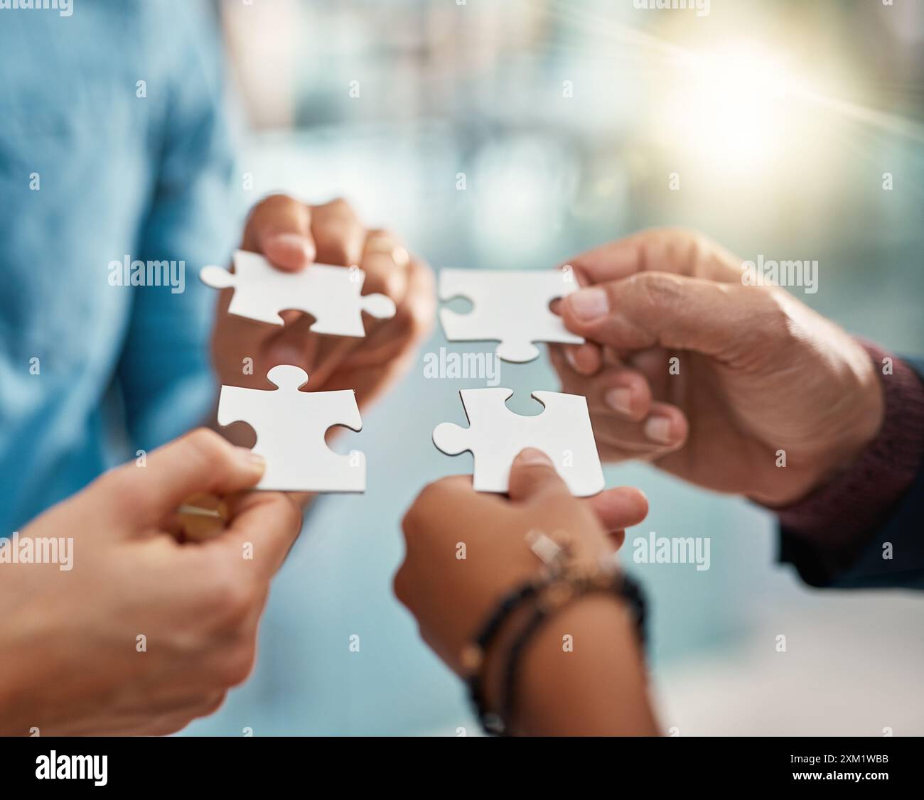 Business people, puzzle and hands with teamwork, cooperation and ...