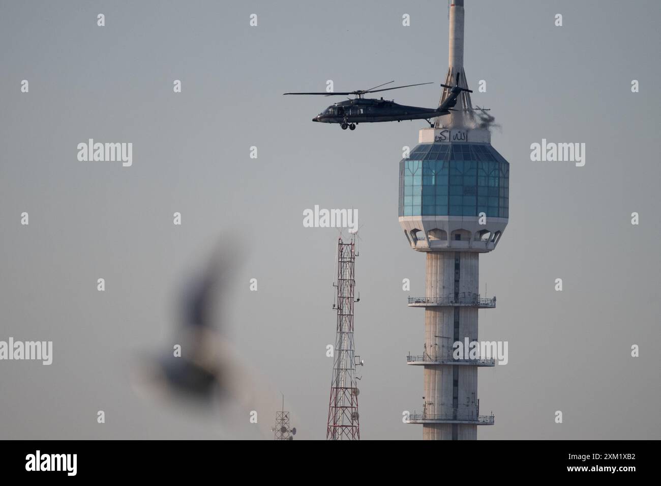 US military helicopter flies past Baghdad Tower - February 2, 2023 ...