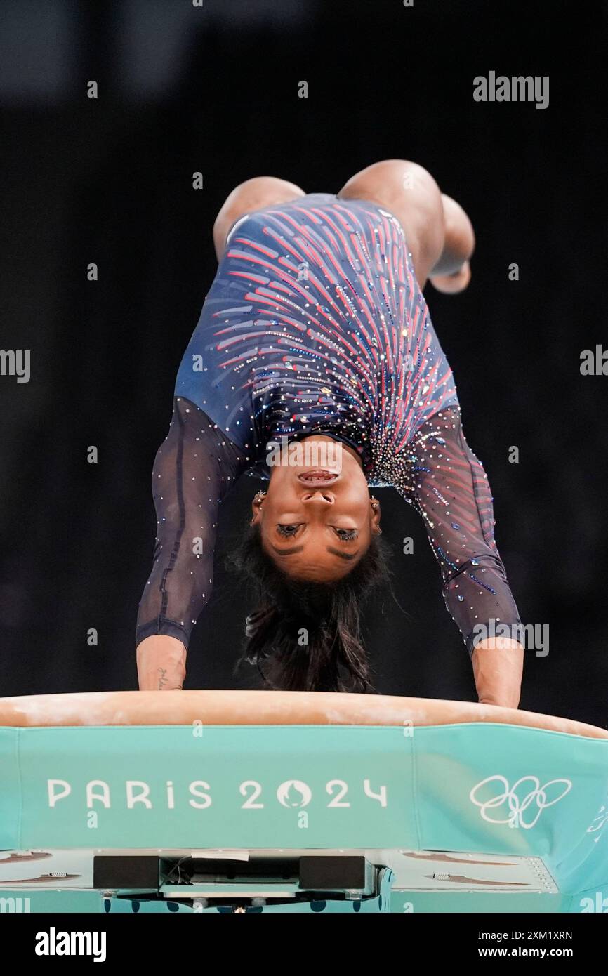 Simone Biles of the United States practices the vault during a ...