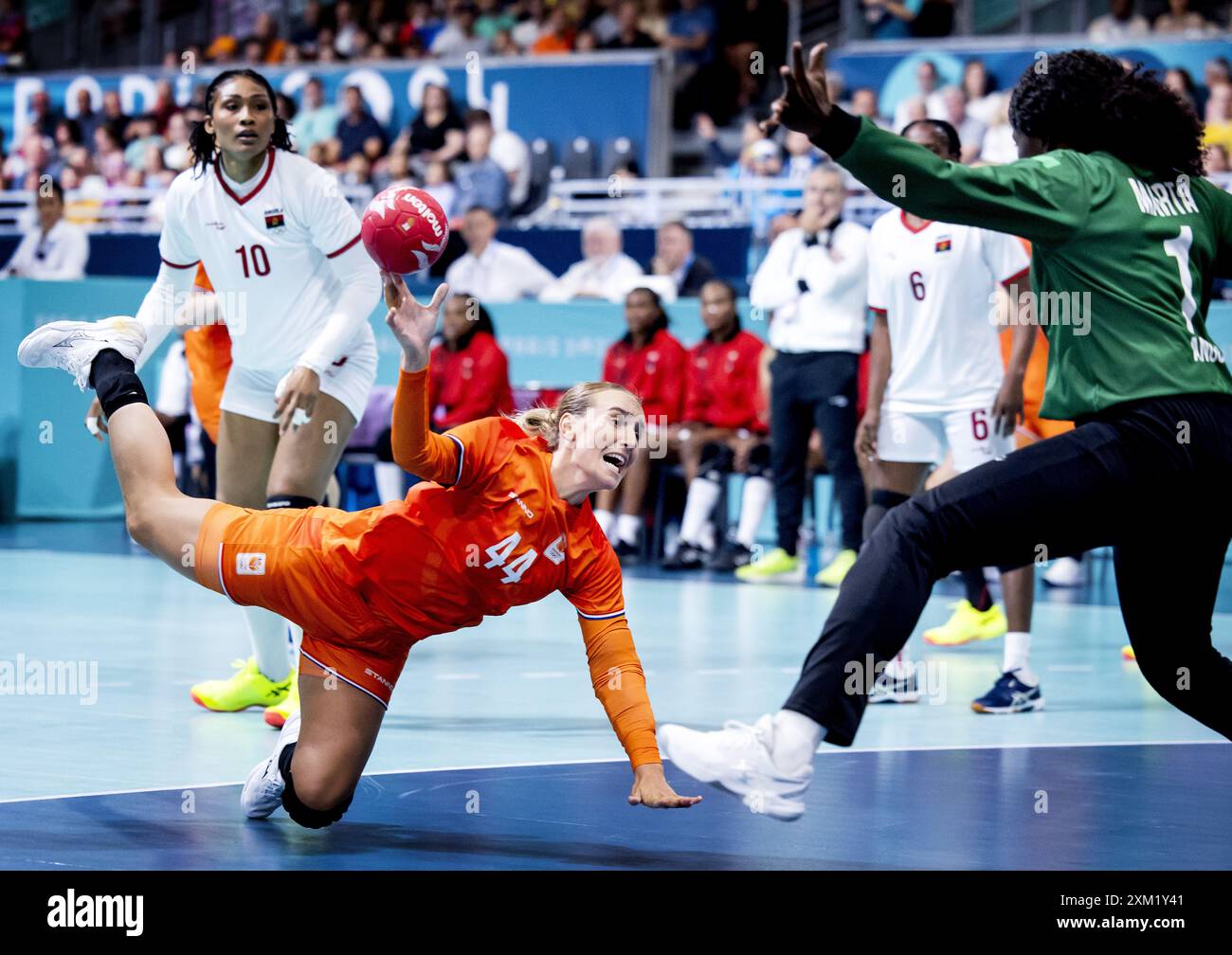 PARIS - Handball player Nikita van der Vliet (L) in action against ...
