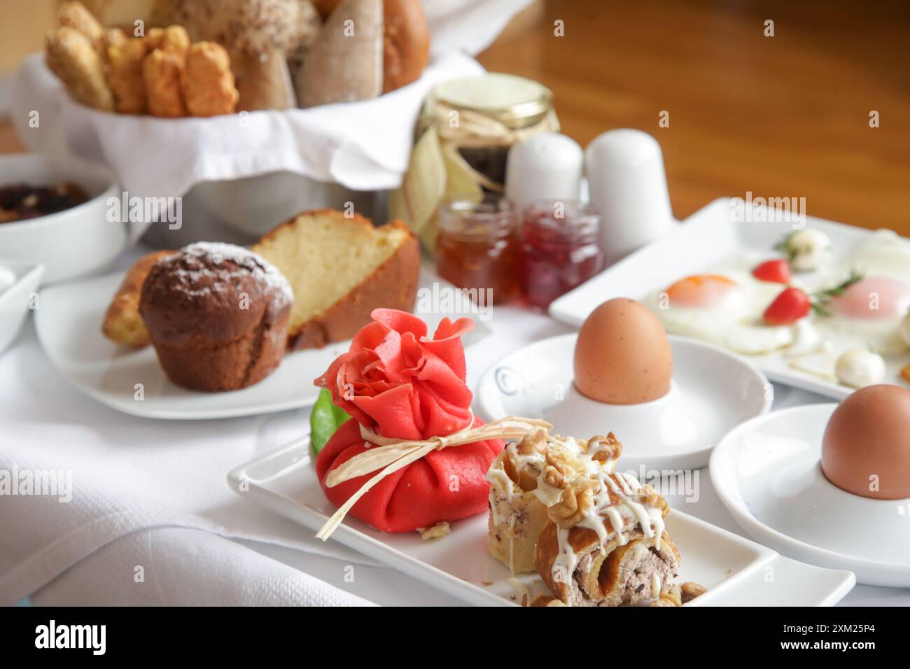 Room service hotel staff carries breakfast tray Stock Photo - Alamy