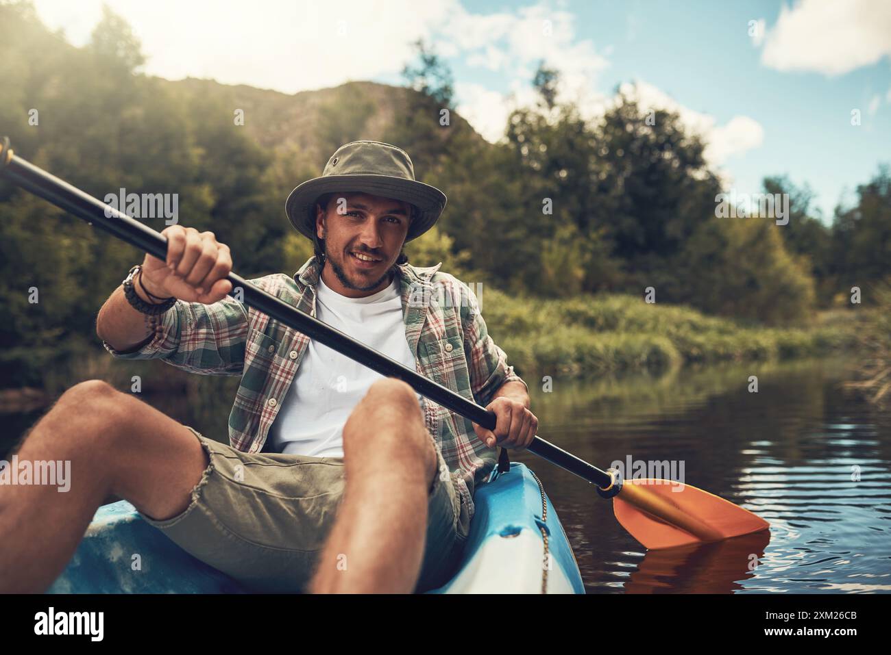 Nature, man and portrait with kayak in river for camping adventure ...