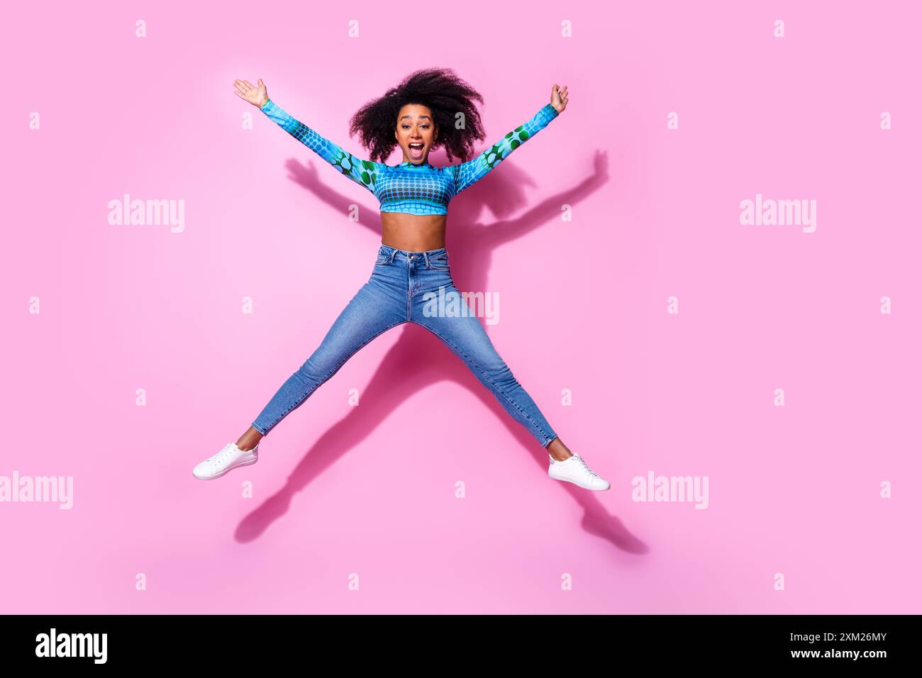 Full size photo of lovely young lady jump excited spread hands legs ...