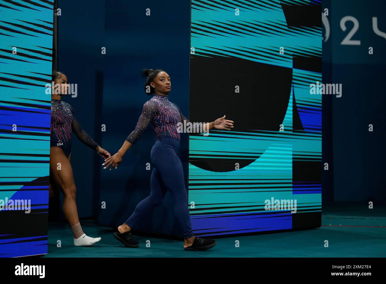 Simone Biles, right, and Jordan Chiles of the United States walk to the ...