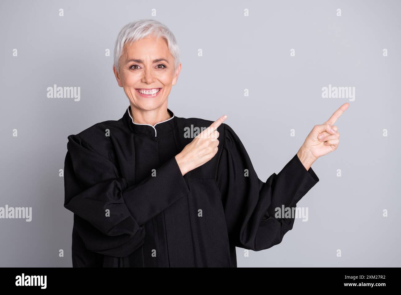 Photo of supreme court judge woman smiling point finger empty space ...