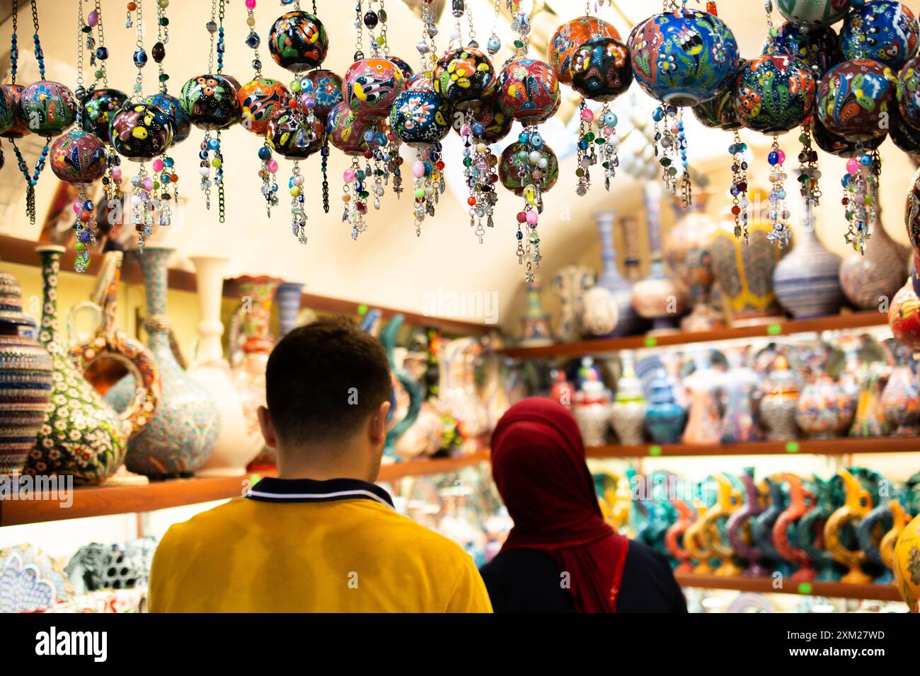 Interior view of the Grand Bazaar. Tourists shopping in the Grand ...