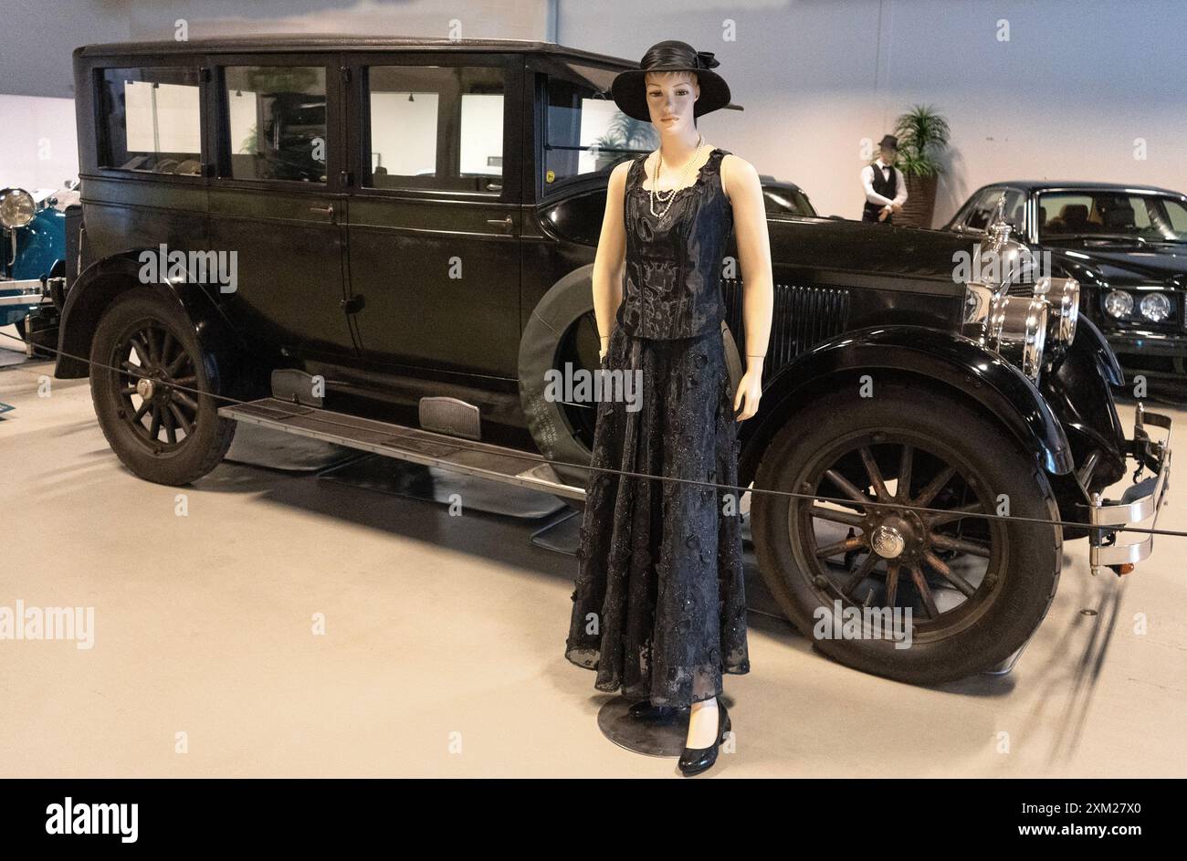 A female mannequin in 1930s costume in front of a 1934 Rolls-Royce ...