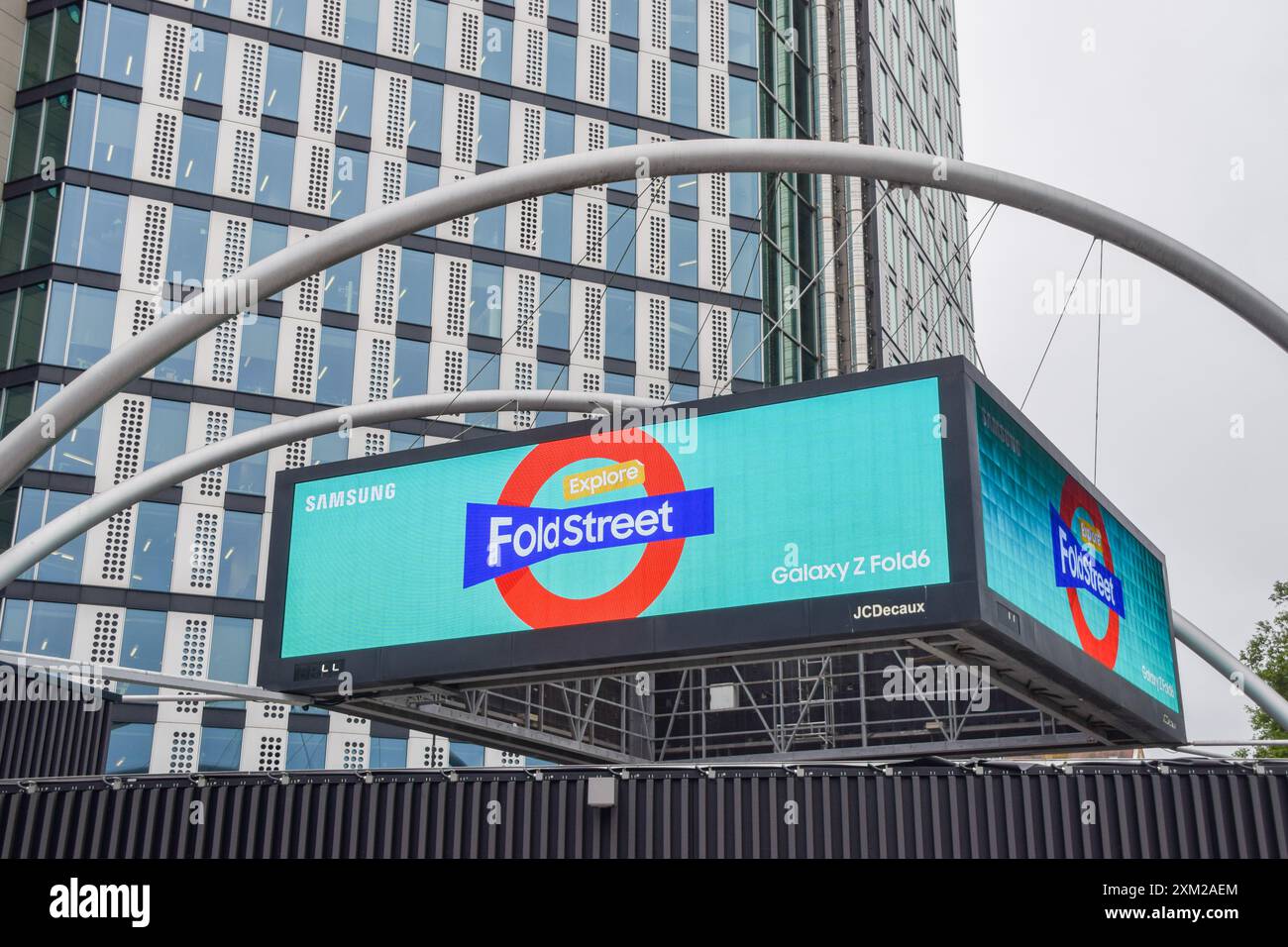 London, UK. 25th July 2024. A digital billboard advertises Fold Street ...