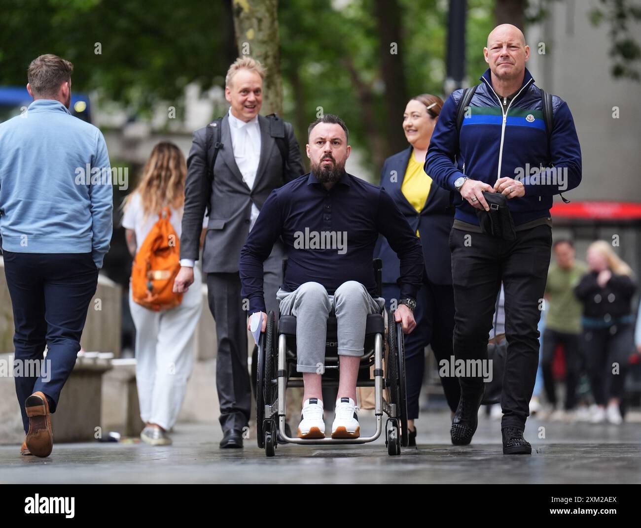 Martin Hibbert (centre), who was injured in the May 2017 Manchester ...