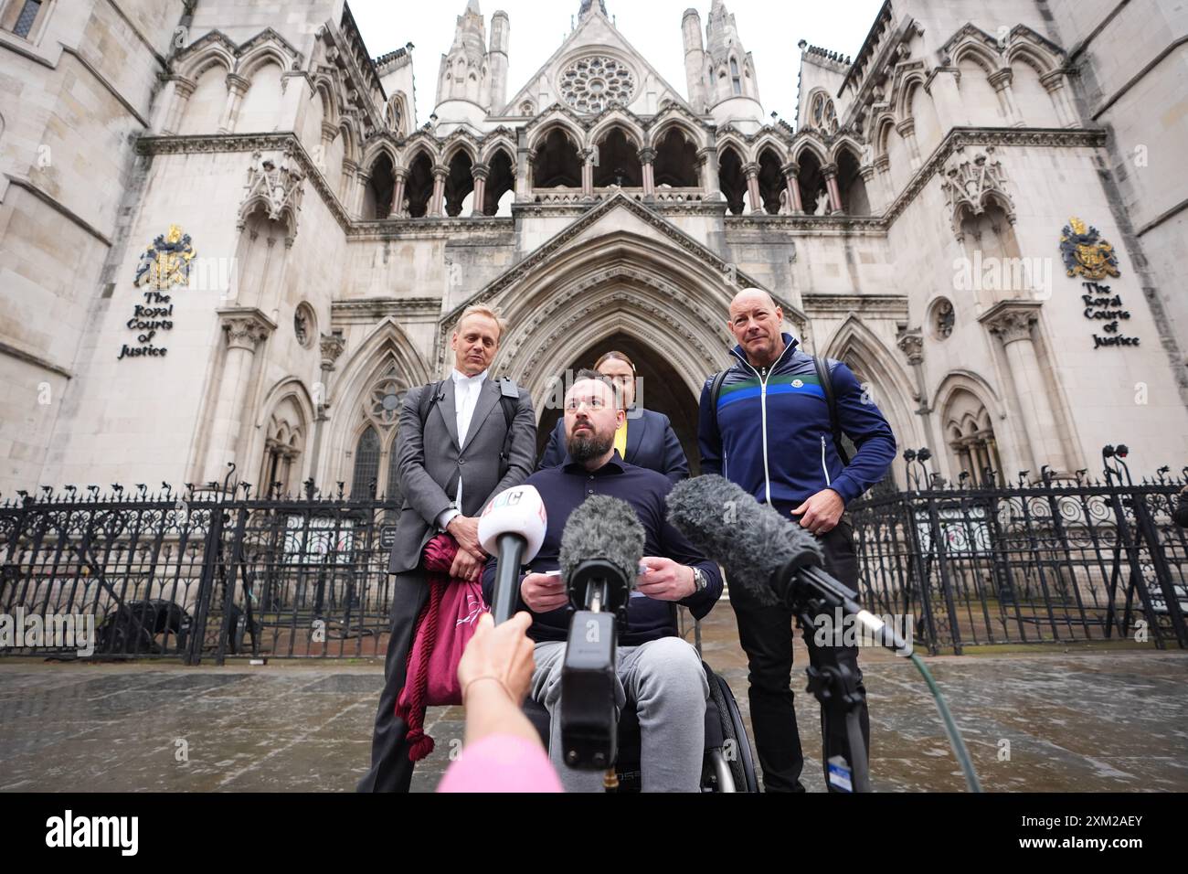 Martin Hibbert (centre), who was injured in the May 2017 Manchester ...