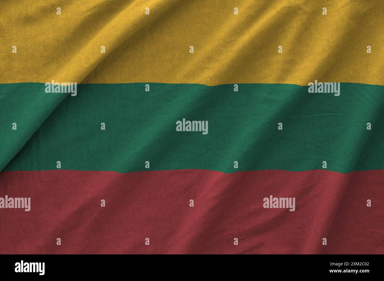 Lithuania flag depicted on folded wavy fabric of old cloth close up ...