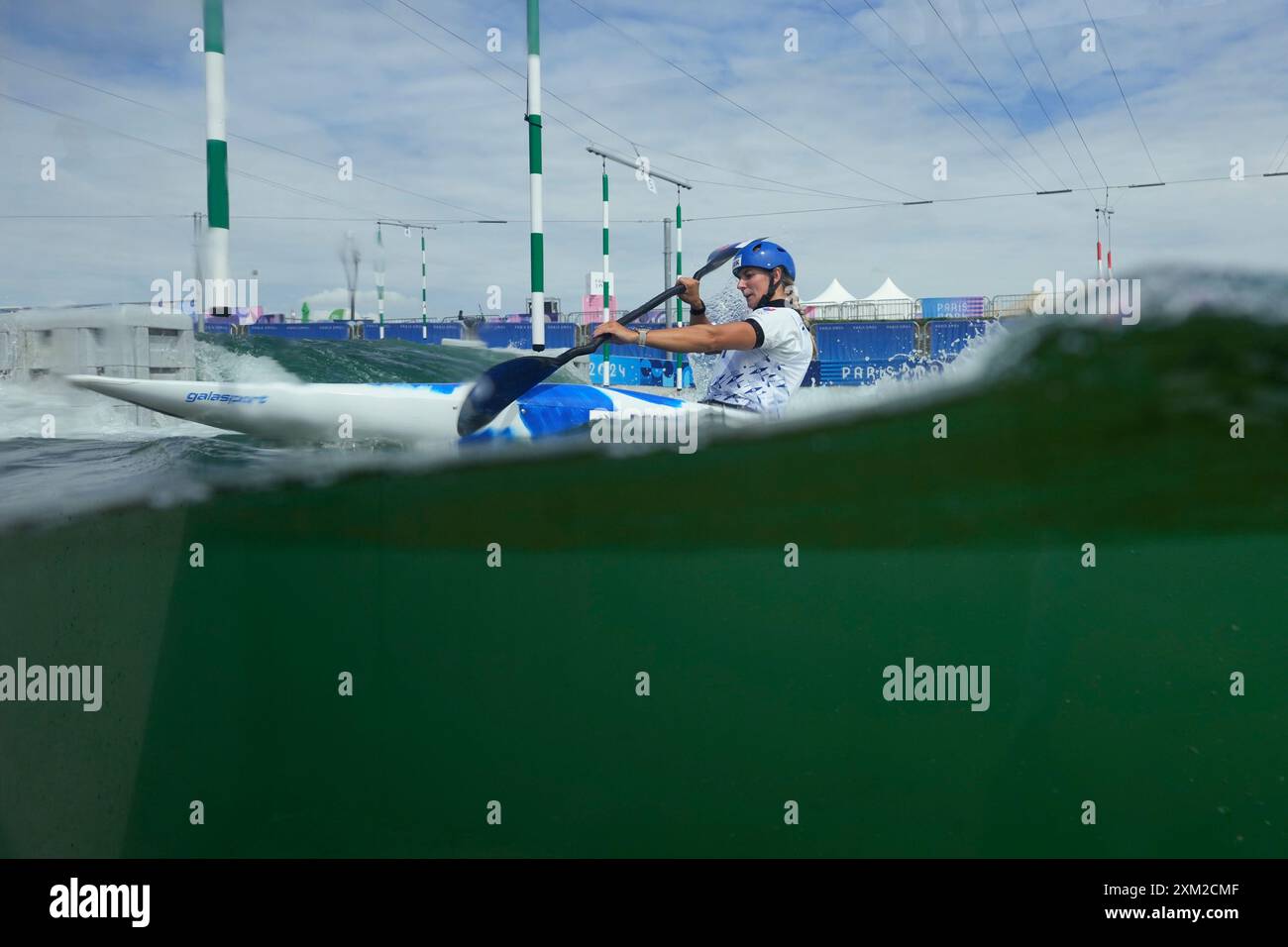 Eliska Mintalova, of Slovakia, trains on the canoe slalom course ahead ...