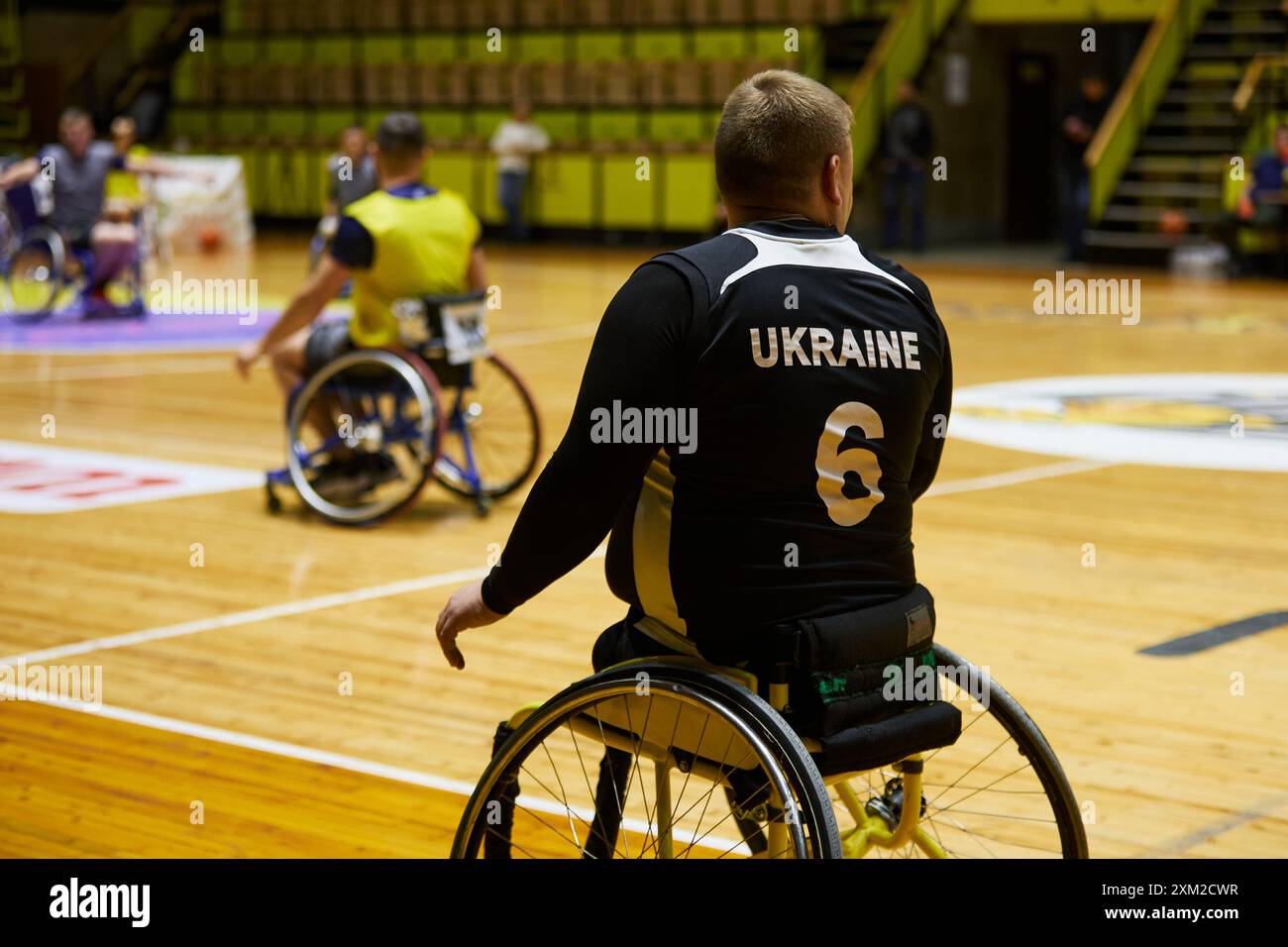 Adaptive basketball coach in a wheelchair on court. Kyiv - 12 December ...