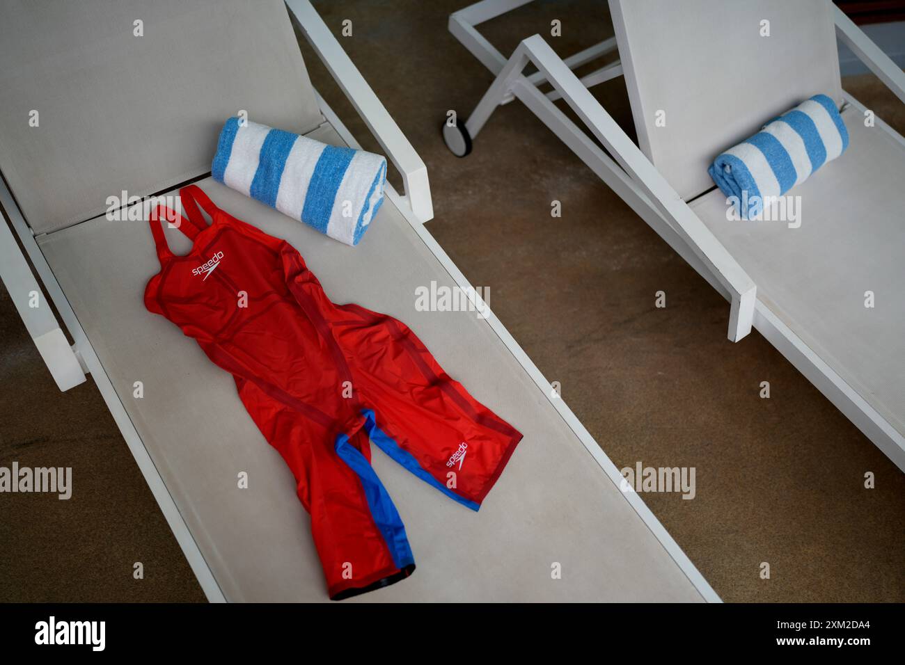 A Speedo Fastskin LZR Pure Valor 2.0. sits on a chair before Jenna ...