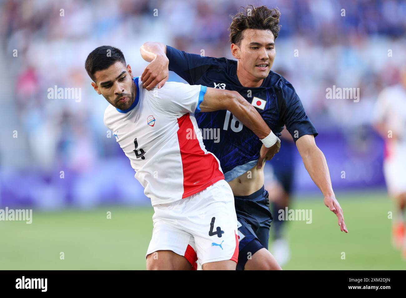Bordeaux, France. 24th July, 2024. (L to R) Rivas Daniel (PAR), Kein Sato (JPN) Football/Soccer ...