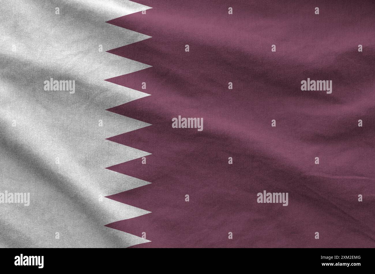Qatar flag depicted on folded wavy fabric of old cloth close up Stock ...