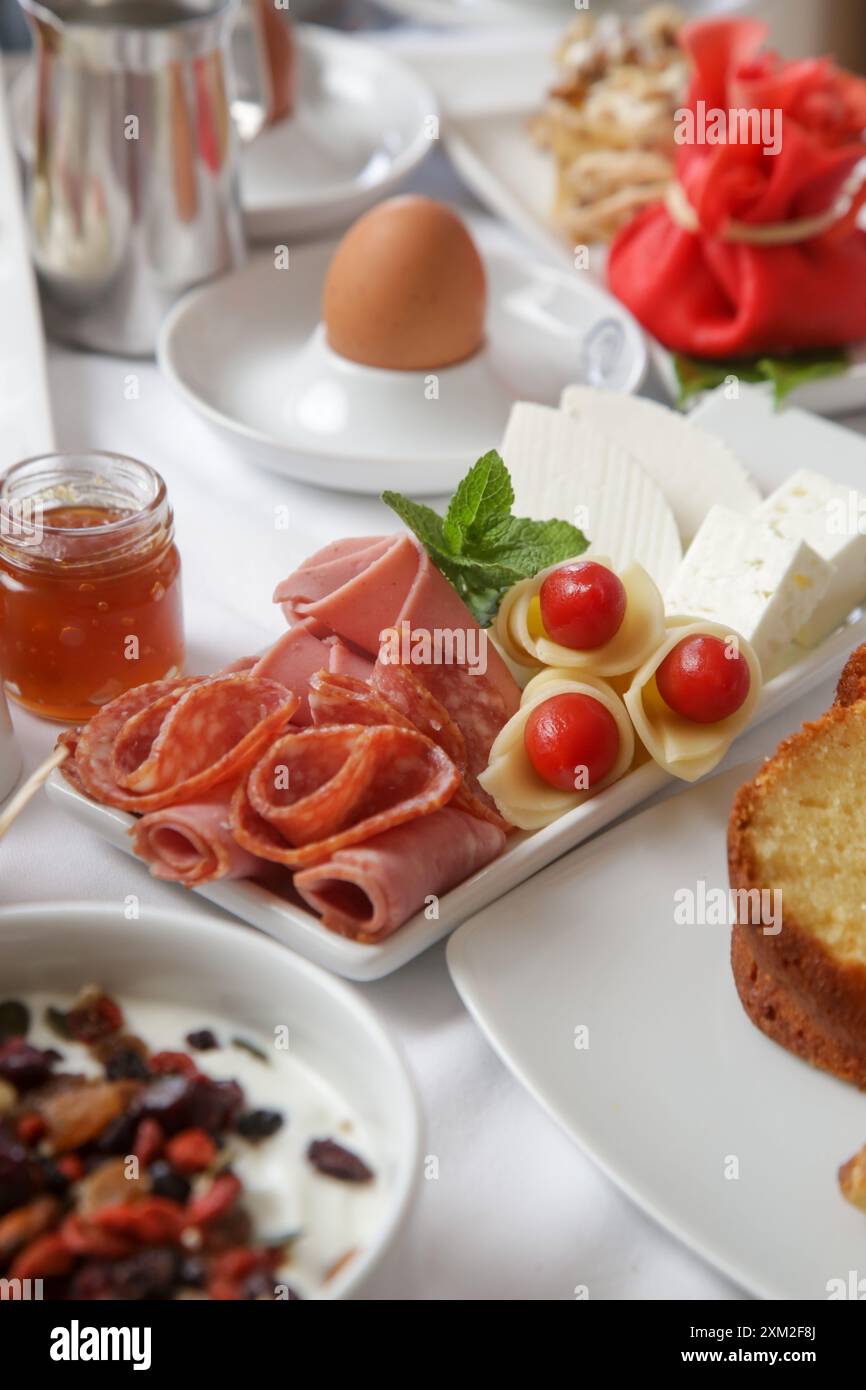 Classic hotel breakfast with various choice of food, eggs, cereals ...