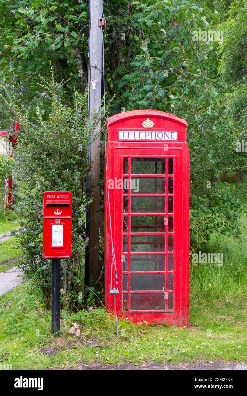 Scotland, United Kingdom - July 18 2024: famous red public payphone box ...