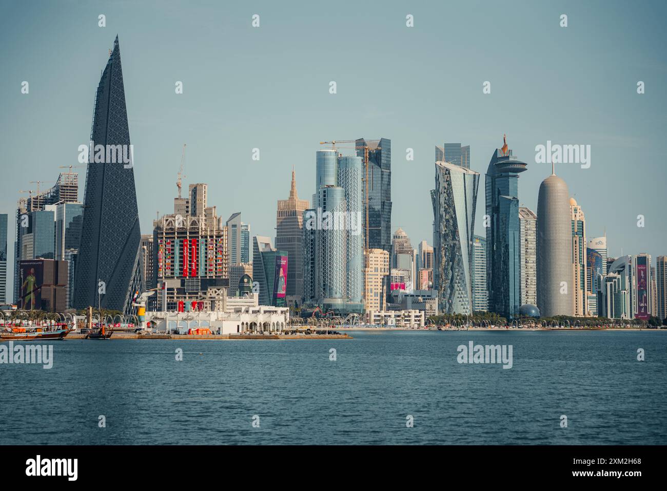 The modern skyline of Doha, Qatar with iconic skyscrapers and clear ...