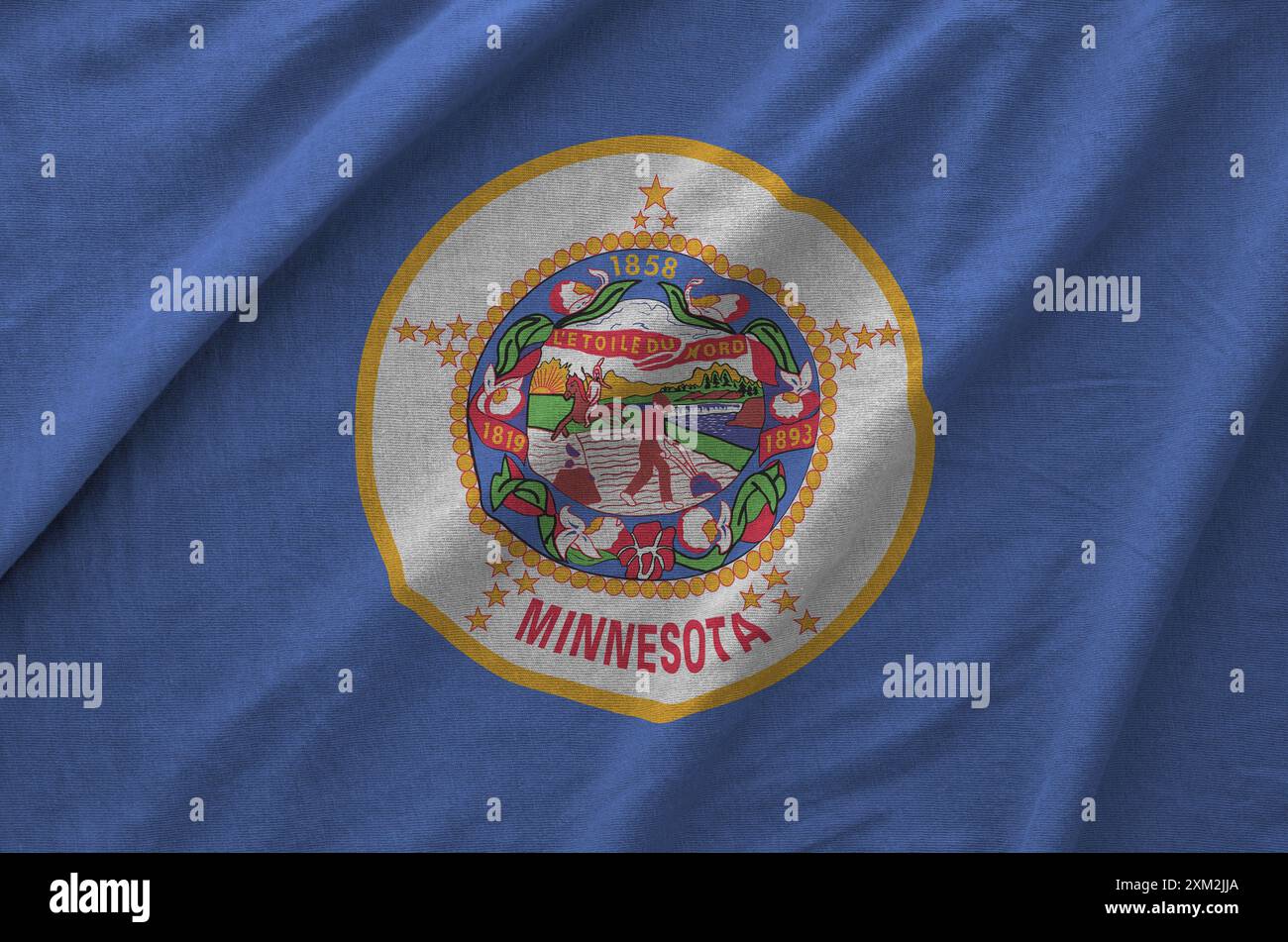 Minnesota US state flag depicted on folded wavy fabric of old cloth ...