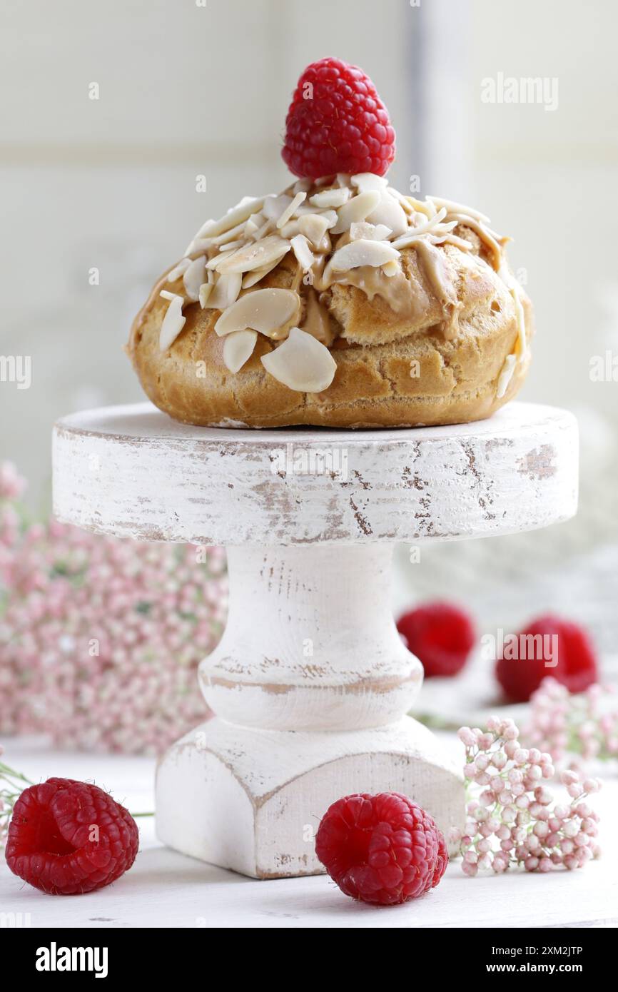 traditional choux pastry eclair dessert on a plate Stock Photo - Alamy