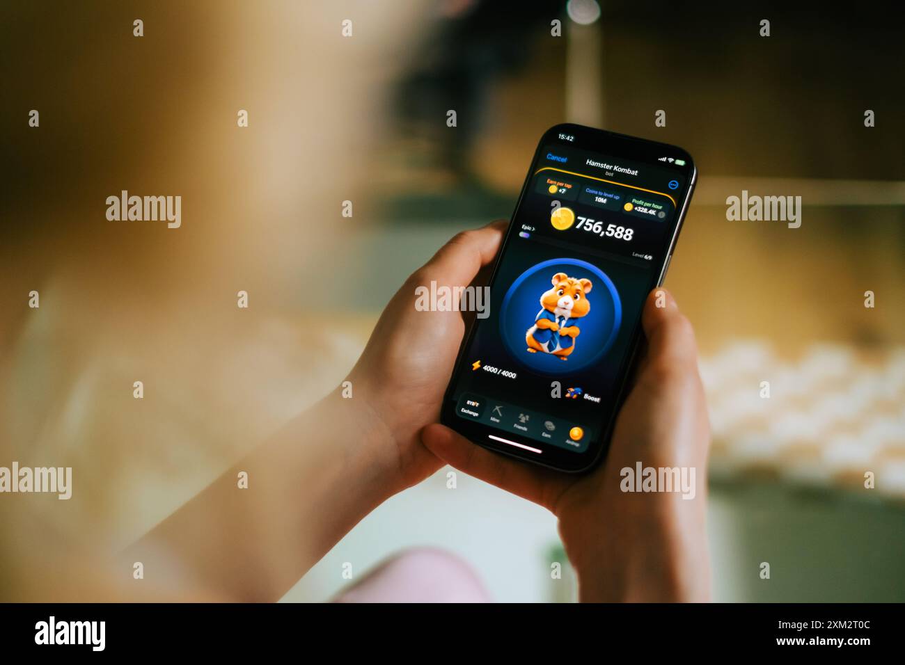 Hamster Kombat telegram bot on iPhone screen. Dusseldorf, Germany. May ...