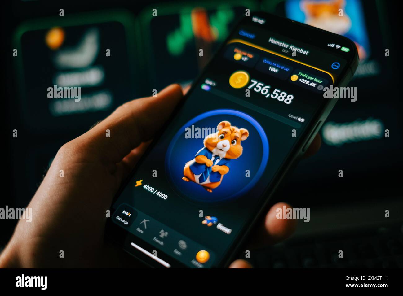Hamster Kombat telegram bot on iPhone screen. Dusseldorf, Germany. May ...
