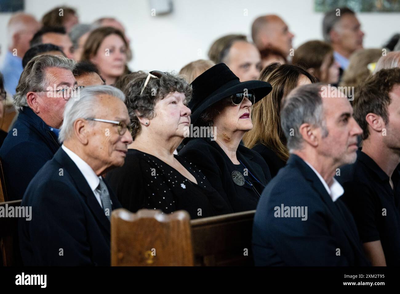 THE HAGUE - Attendees in the Kloosterkerk during the private farewell ...