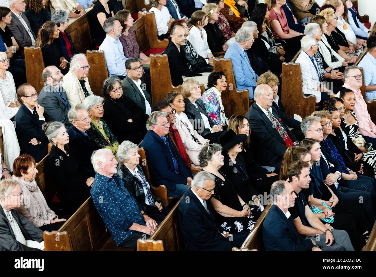 THE HAGUE - Attendees in the Kloosterkerk during the private farewell ...