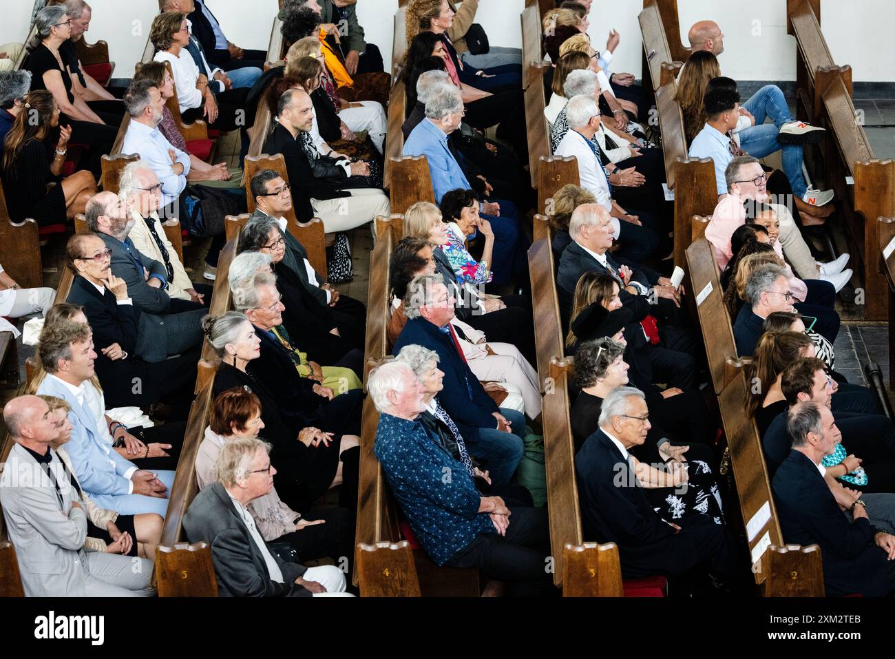 THE HAGUE - Attendees in the Kloosterkerk during the private farewell ...