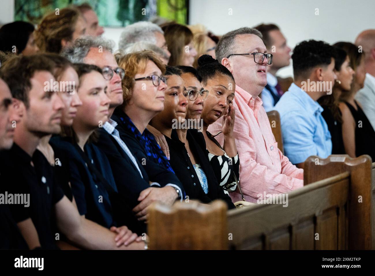 THE HAGUE - Attendees in the Kloosterkerk during the private farewell ...