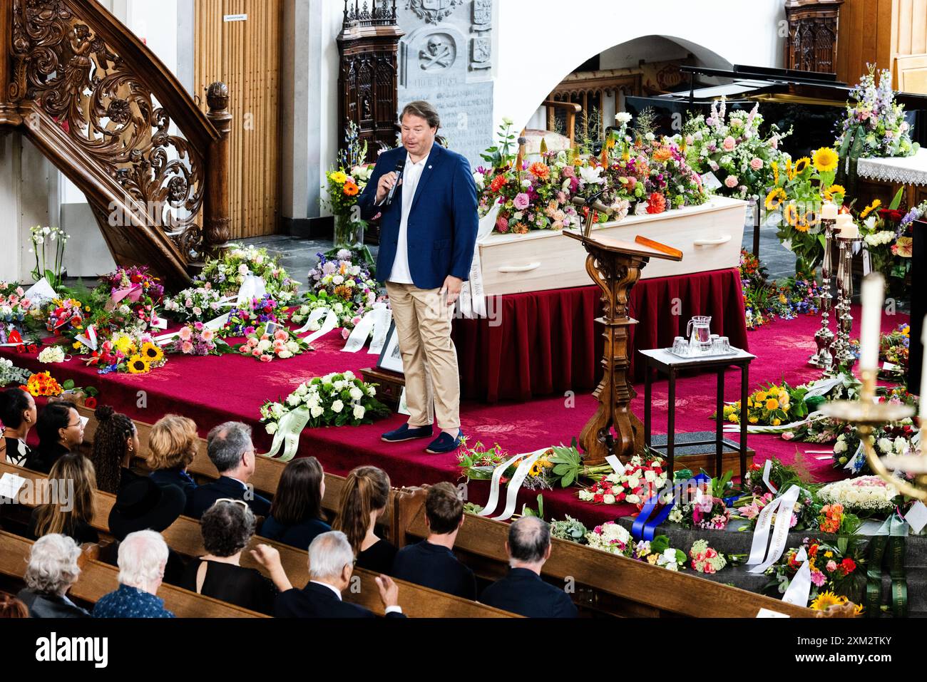 THE HAGUE - Attendees in the Kloosterkerk during the private farewell ...