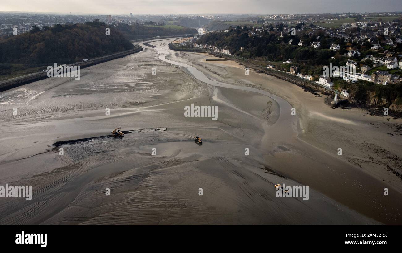 Aerial photograph of lorries carrying out silting work and the Pointe a ...
